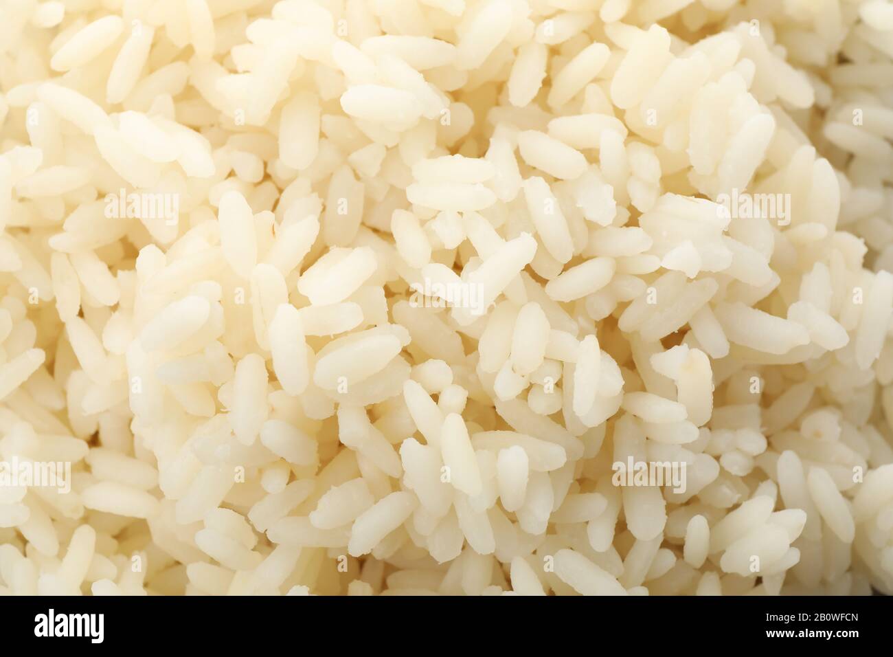 Boiled white rice texture background, close up Stock Photo - Alamy