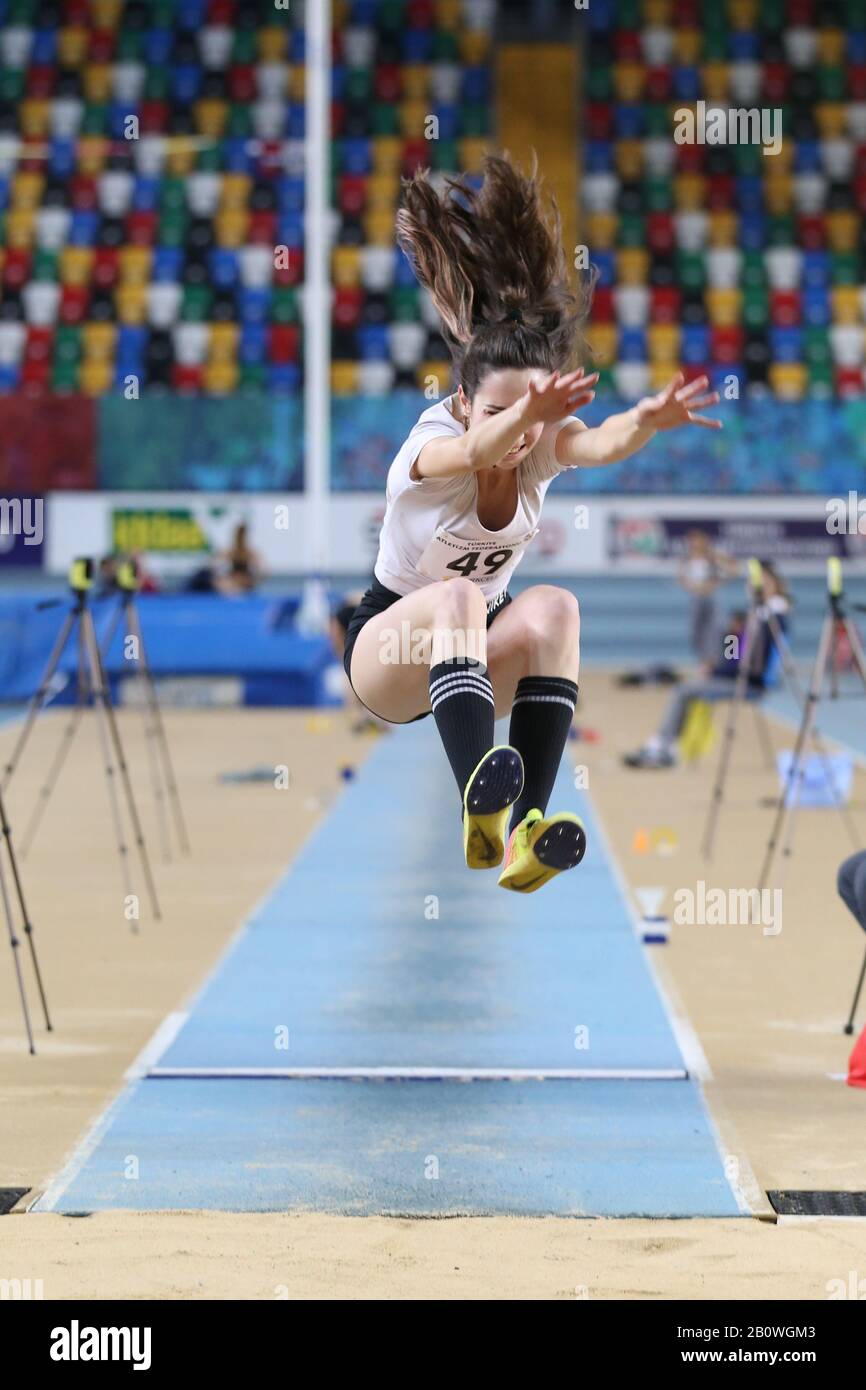 ISTANBUL, TURKEY - FEBRUARY 02, 2020: Undefined athlete long jumping ...