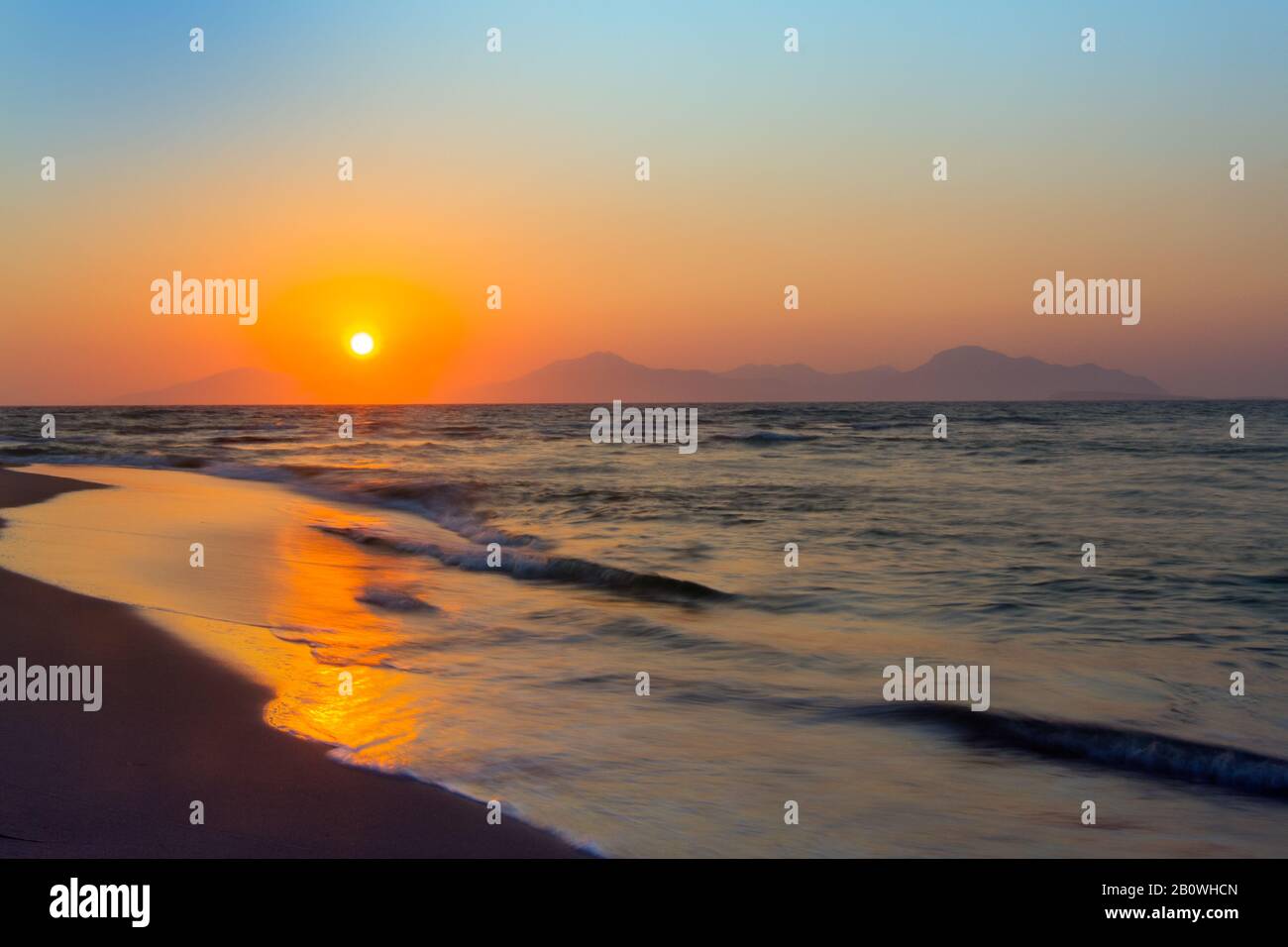 Sunset on a beach. Kos, Greece Stock Photo - Alamy
