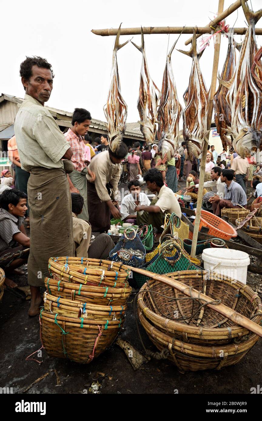 Baskets and hanging fish at Sittwe fish market, Rakhine State, Myanmar ...