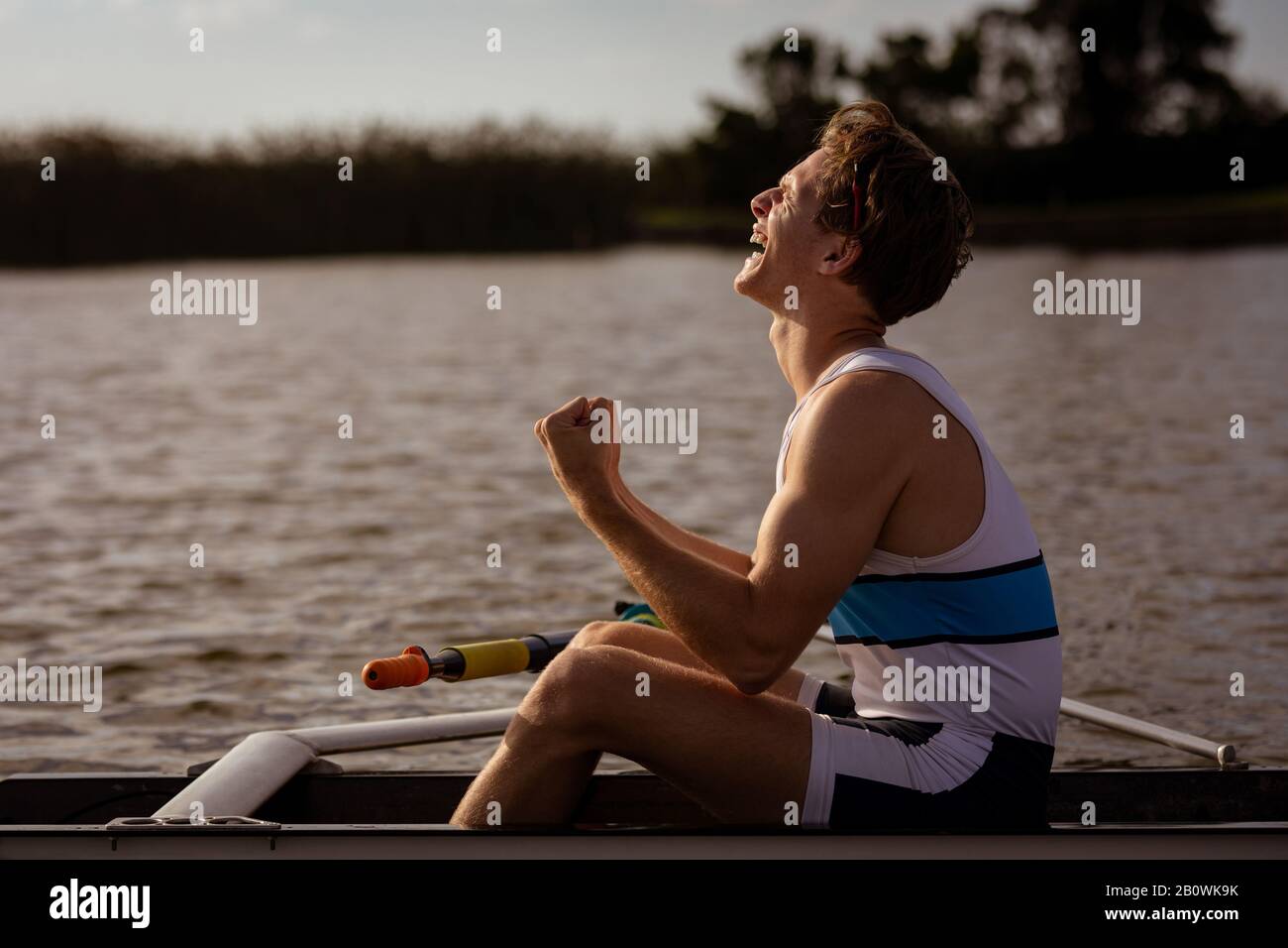Man rowing boat hi-res stock photography and images - Alamy