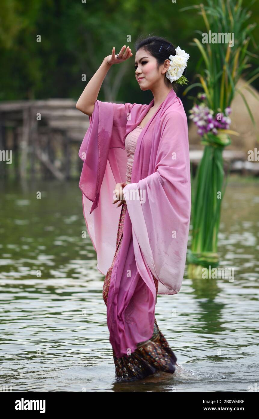 Traditional costume of southeast asia hi-res stock photography and ...