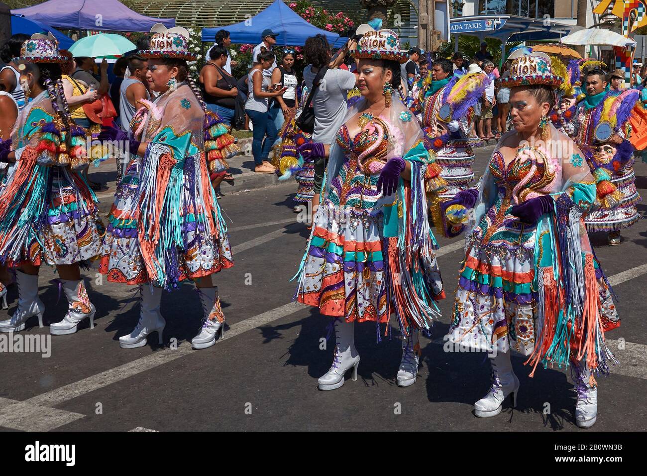 Morenada Dance Group performing during a street parade at the annual ...