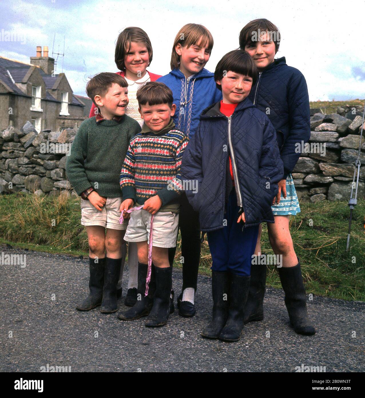 1960s, historical, smiling young children standing together for a photo ...