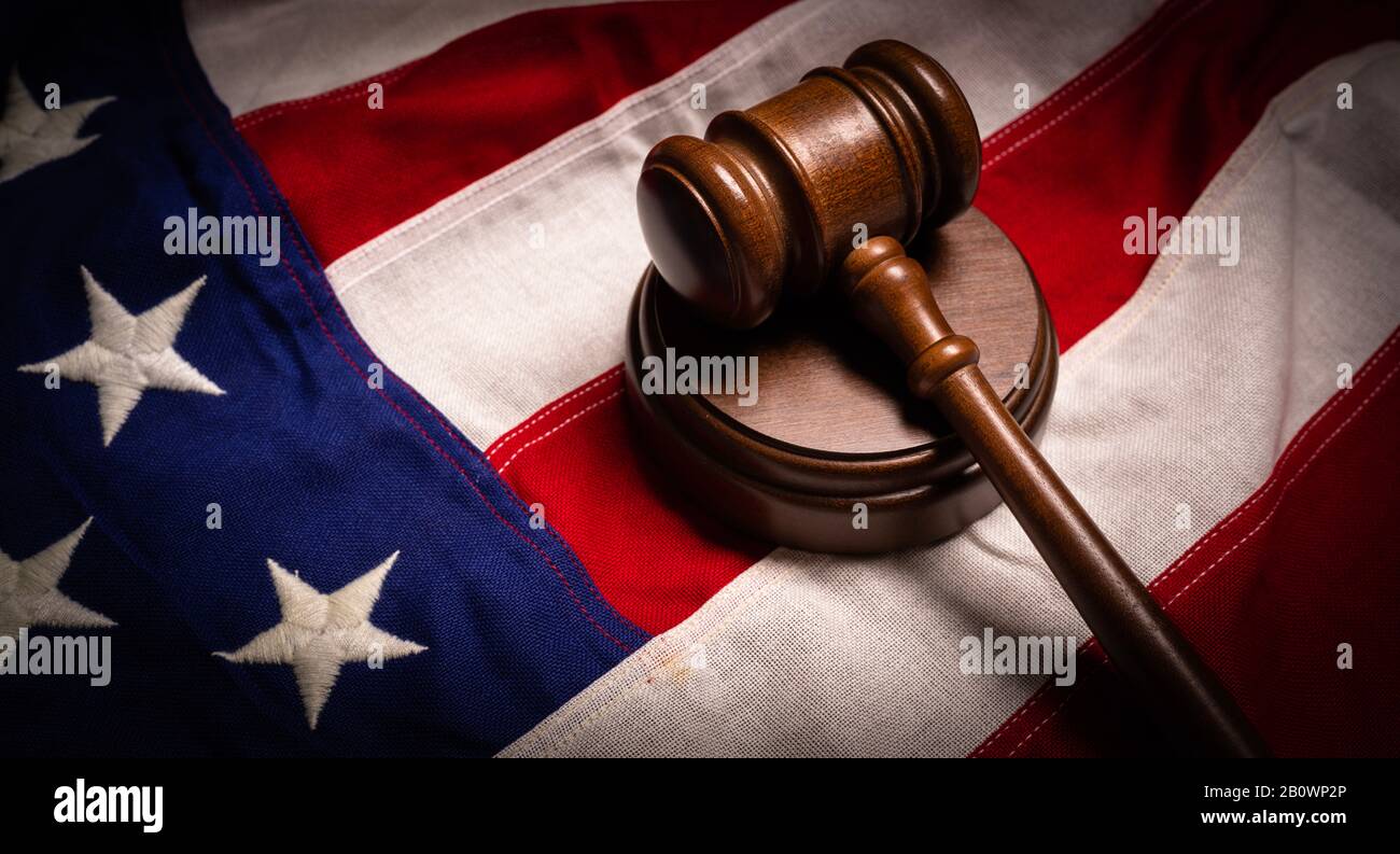 Judges gavel and an American flag -justice theme Stock Photo - Alamy