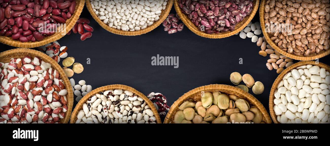 decorative set of beens and legumes on black background Stock Photo - Alamy