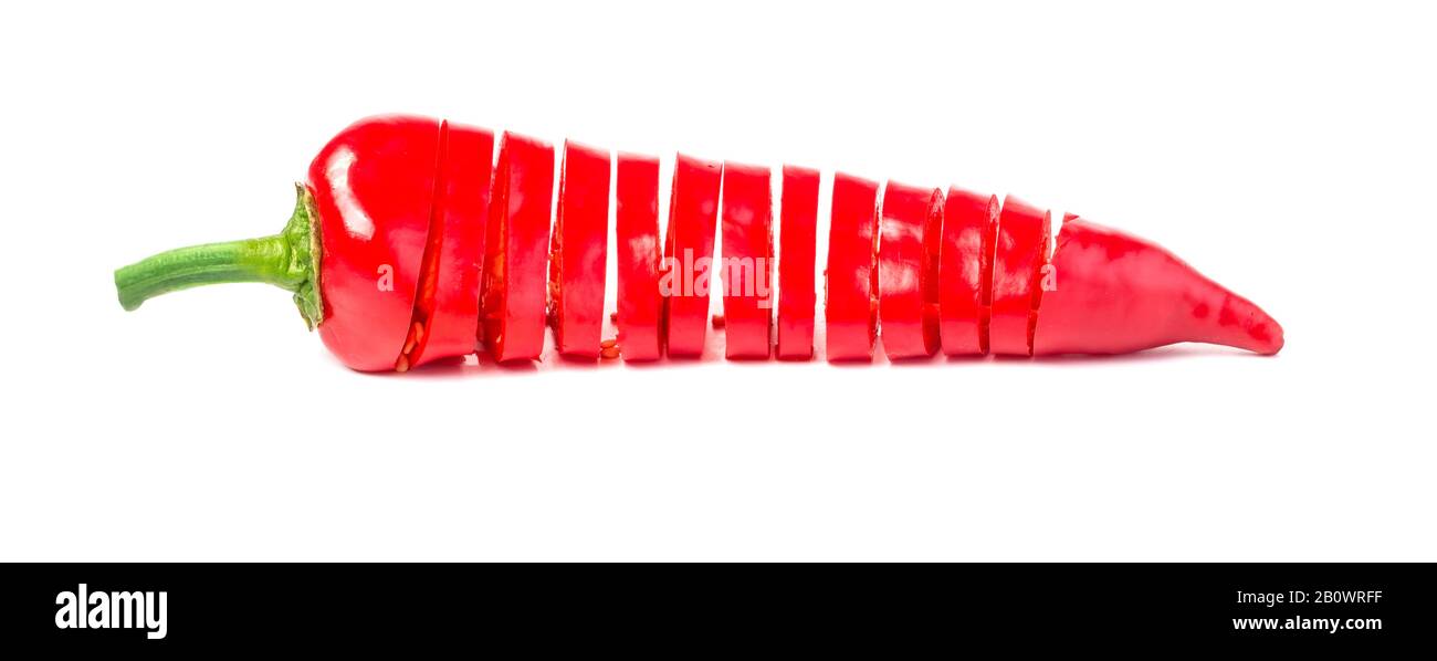 red hot pepper cut on a white background isolated Stock Photo - Alamy