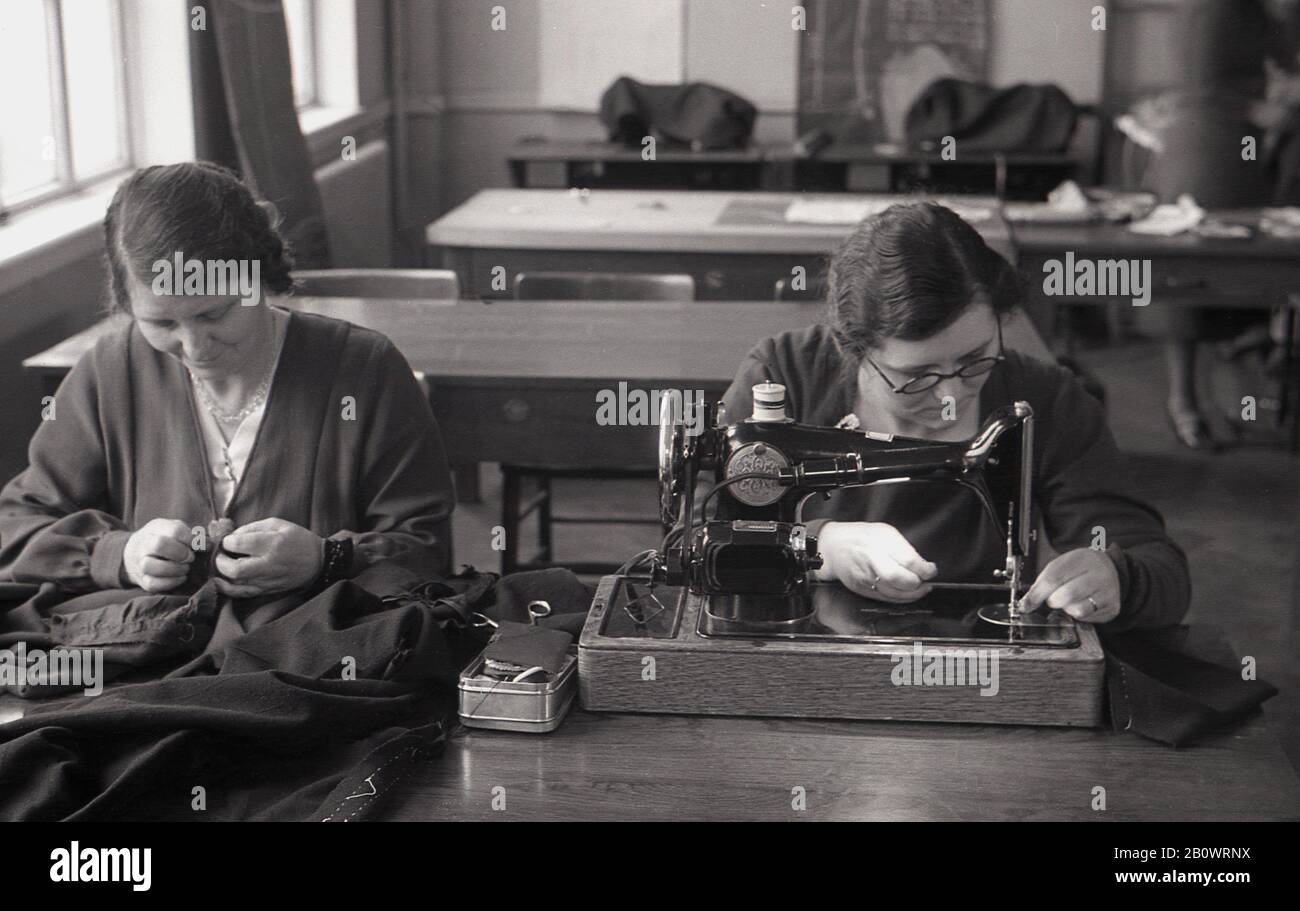 1940s, historical, adult education, two ladies in a sewing night school ...