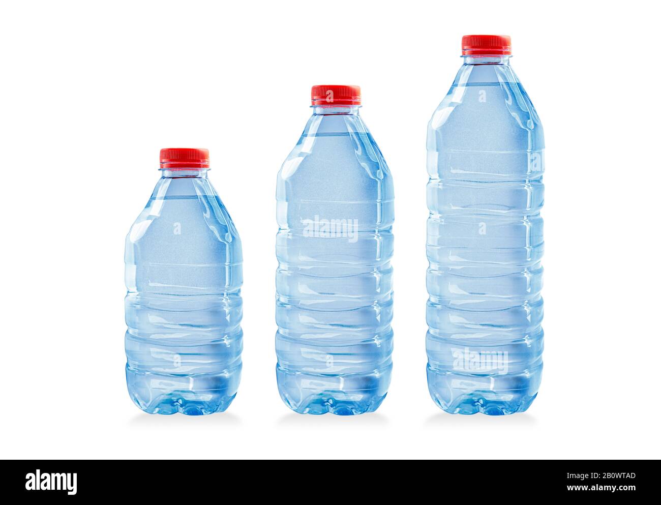 Plastic bottles of still healthy water isolated on white background ...
