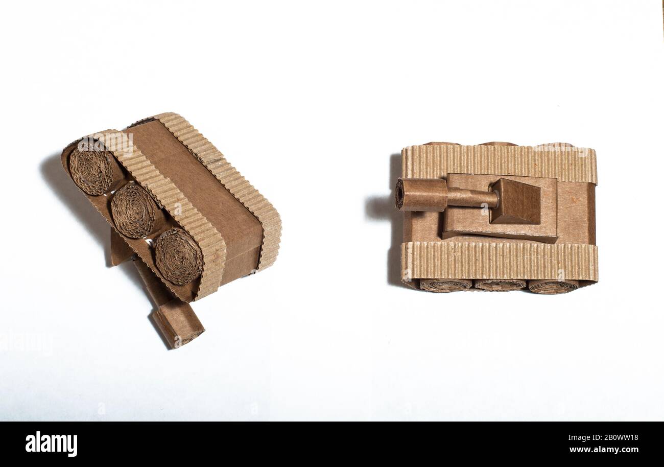 two toy tanks made by children from corrugated cardboard. toy cardboard ...