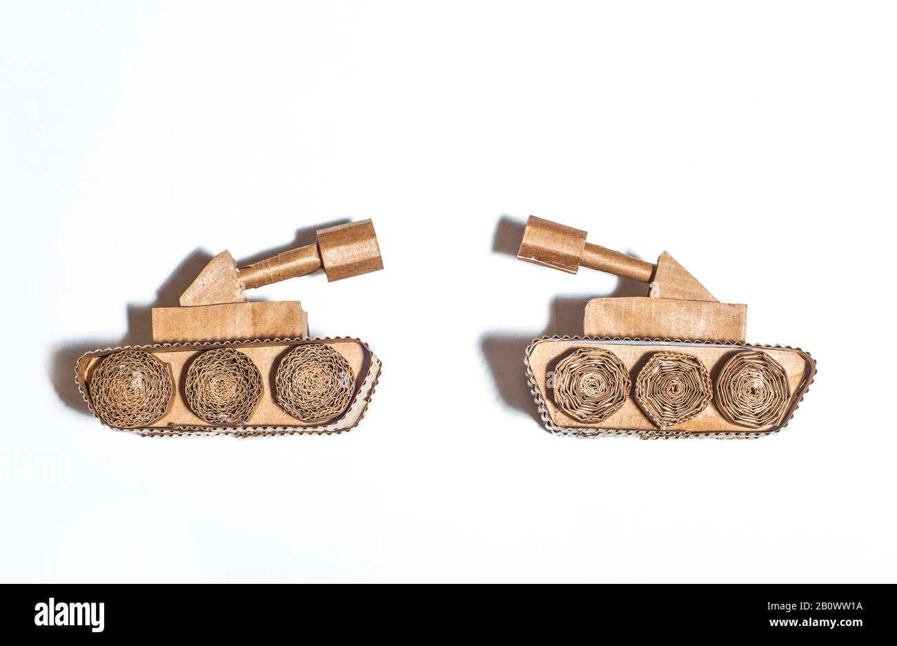 two toy tanks made by children from corrugated cardboard. toy cardboard ...