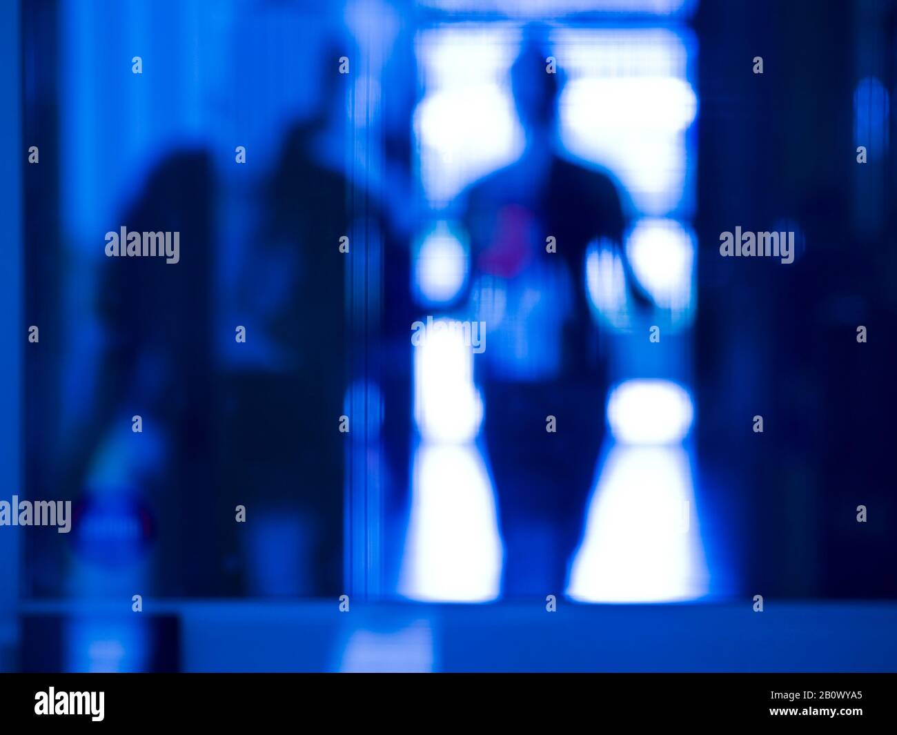 3 three silhouetted people walking hi-res stock photography and images ...