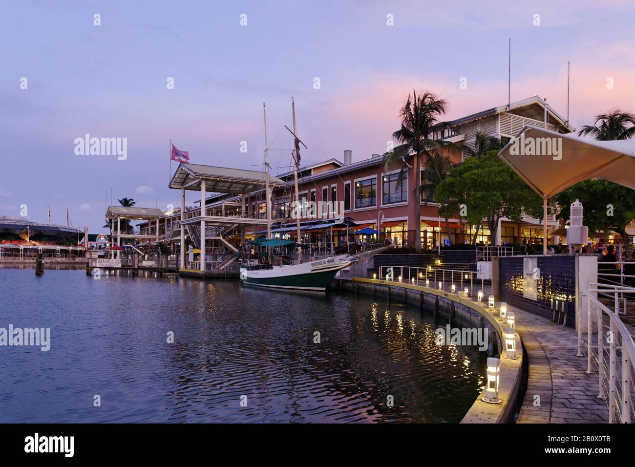 Harbor front at bayside marketplace resort in the evening hi-res stock ...