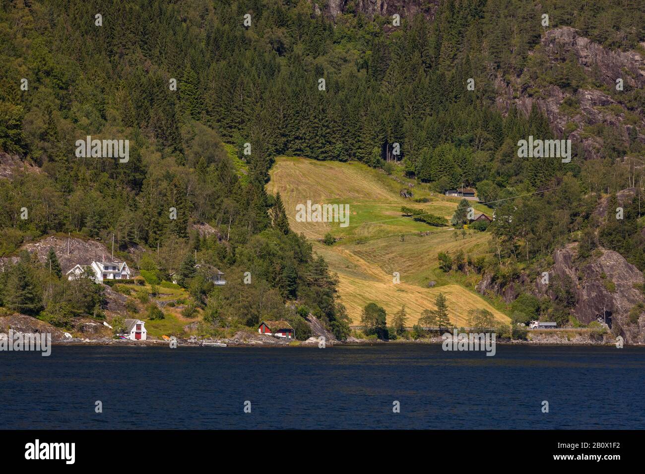 MOFJORDEN, NORWAY - Open pasture and mountains in fjord, Osterøy Island ...