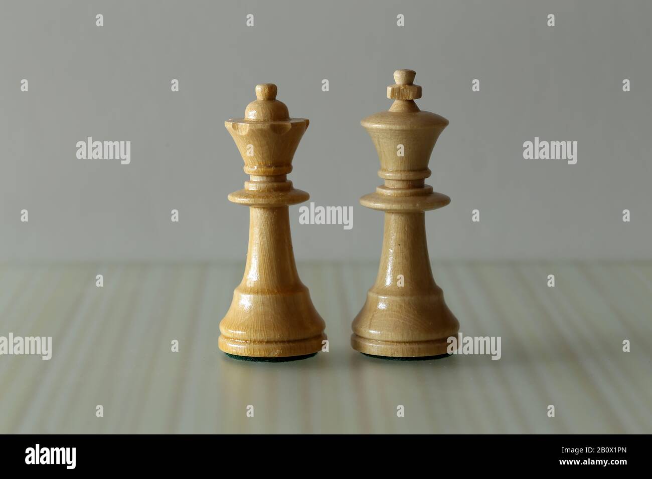 chess pieces on a blurry light background Stock Photo - Alamy