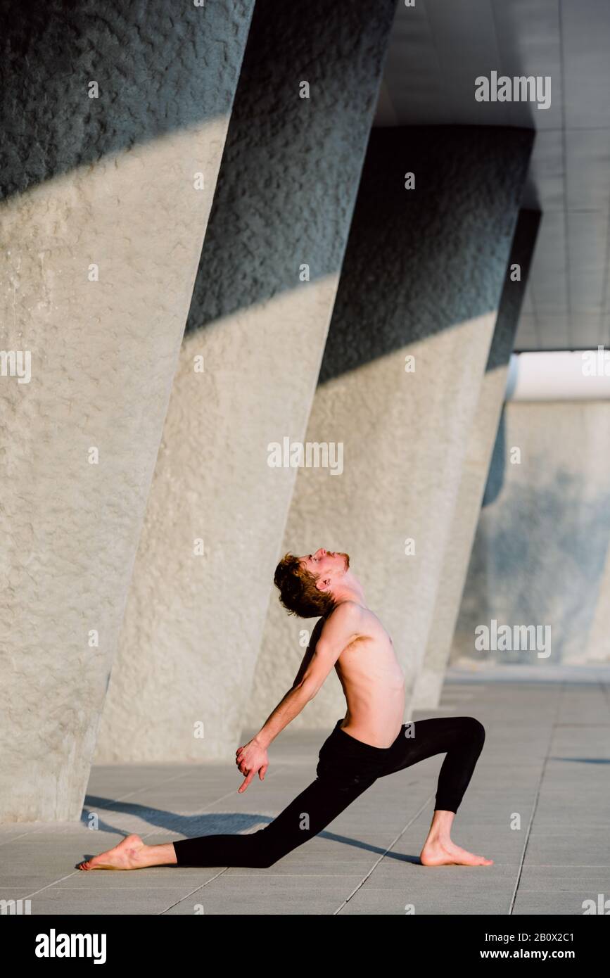 Anjaneyasana posture hi-res stock photography and images - Alamy