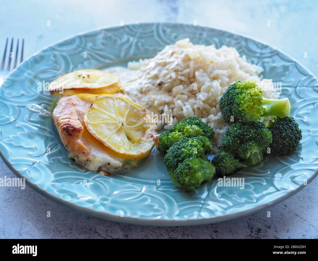 Rice with lemon salmon Stock Photo - Alamy