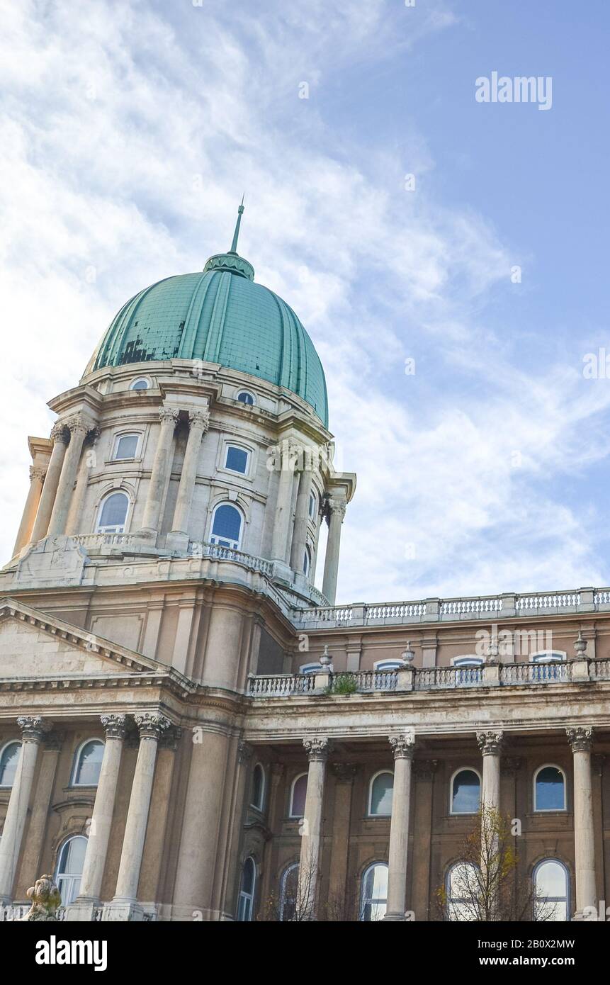 Buda Castle in Budapest, Hungary with light blue sky and clouds above ...