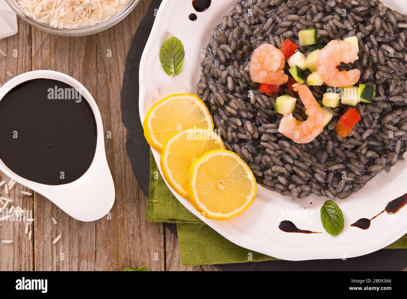 Squid ink risotto Stock Photo - Alamy