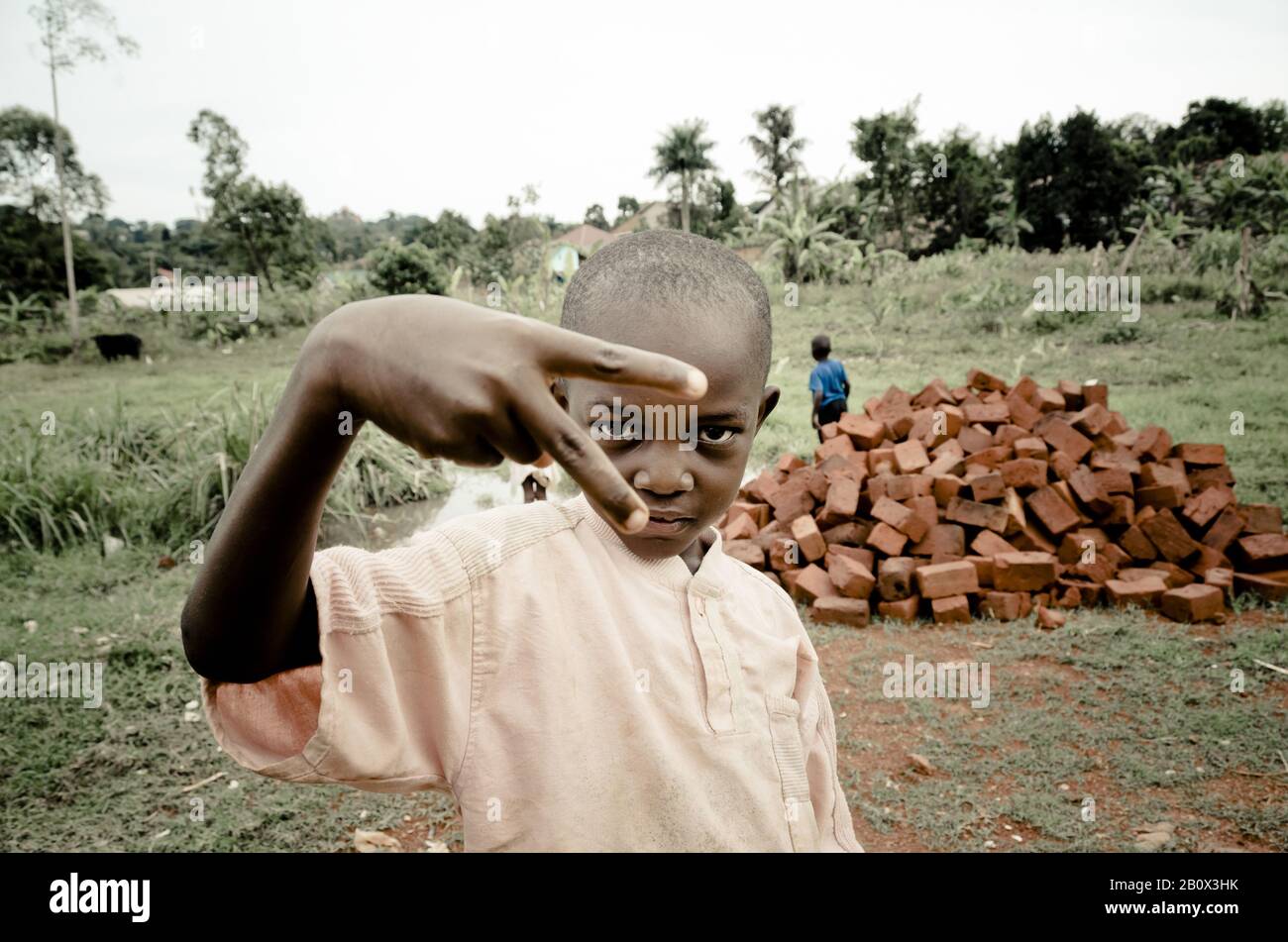 Street child, gestures, hand signals, Kampala, Uganda, East Africa ...