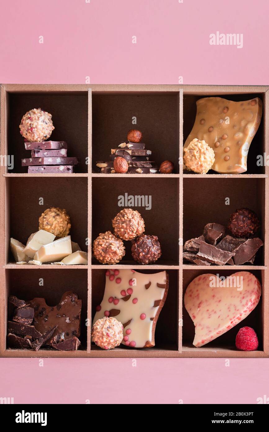 Swiss chocolate mix and tasty pralines in a box. Different types of ...