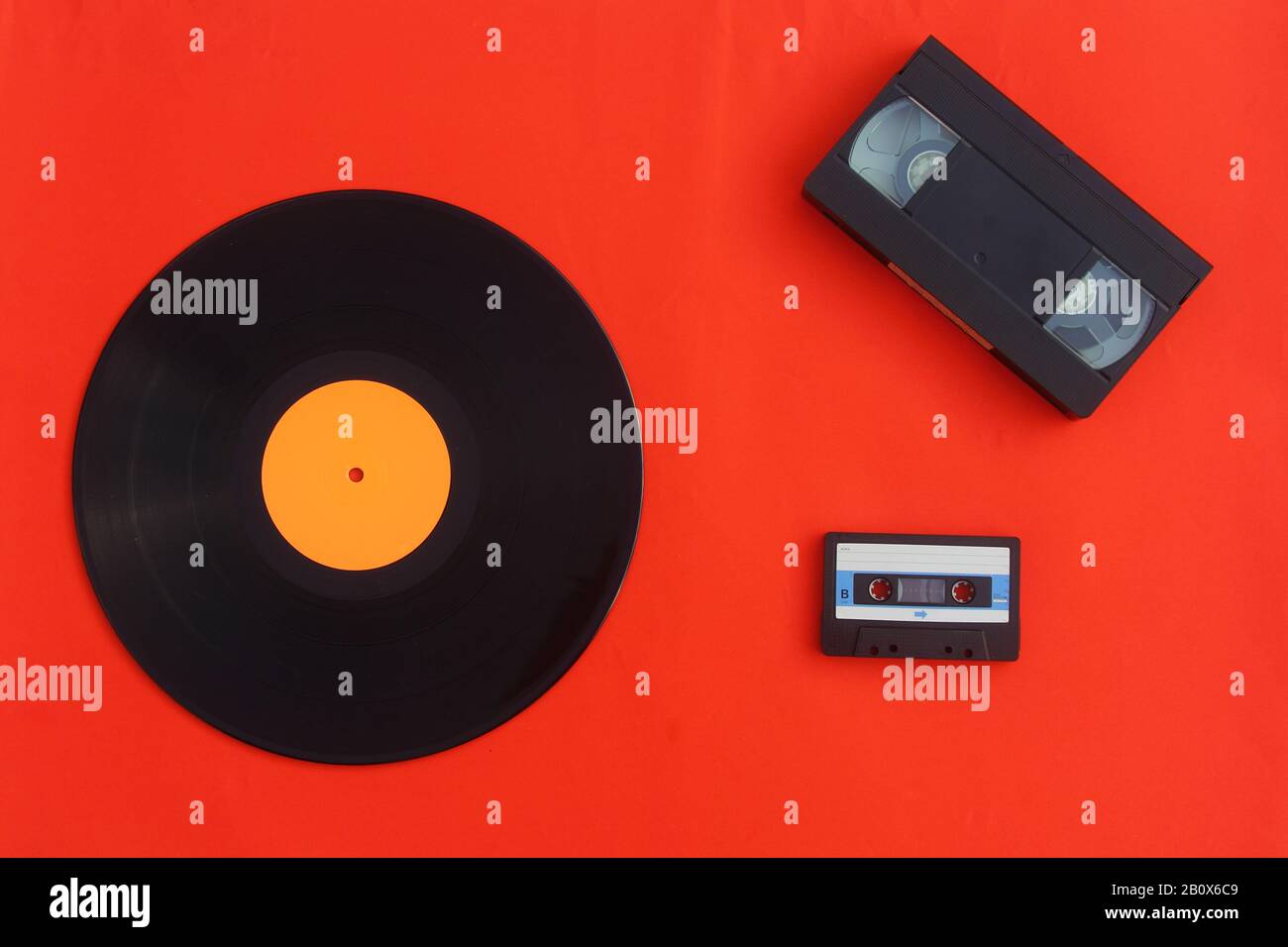 Vinyl record, audio and video cassettes top view Stock Photo - Alamy