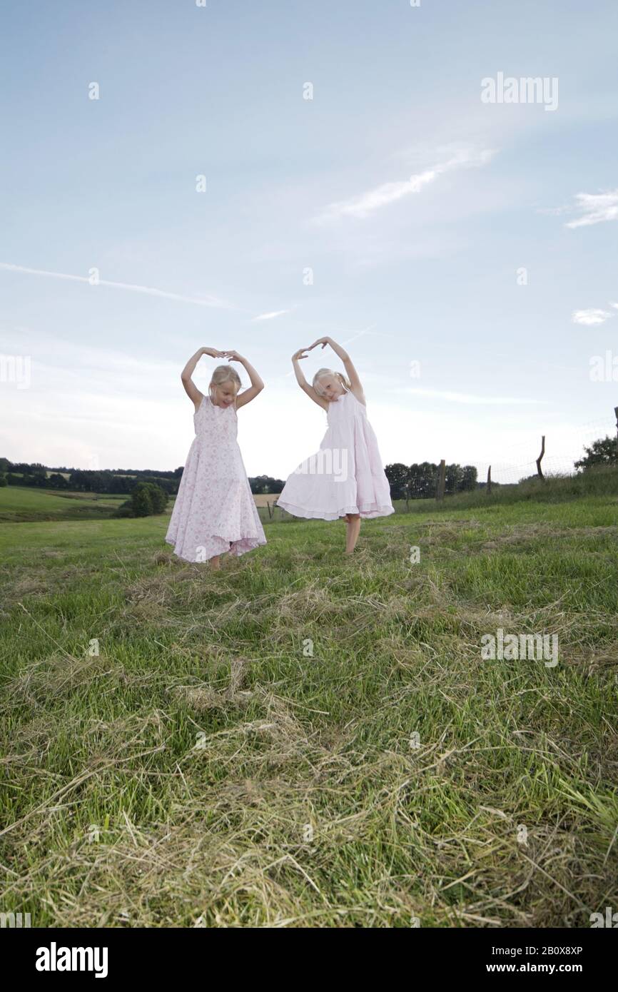 Girl dancing in a meadow hi-res stock photography and images - Alamy