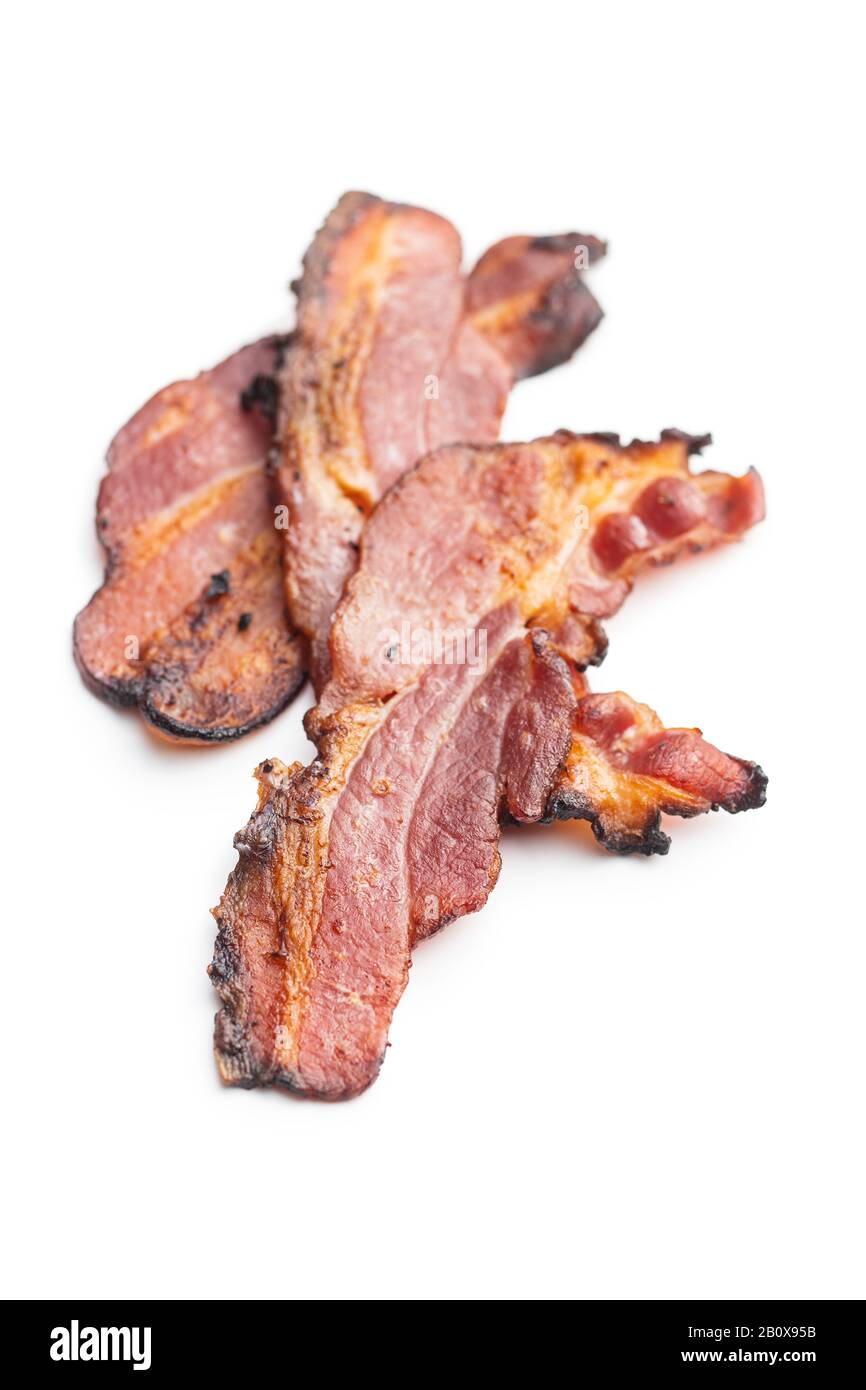 Fried bacon. Sliced roasted bacon isolated on white background Stock ...