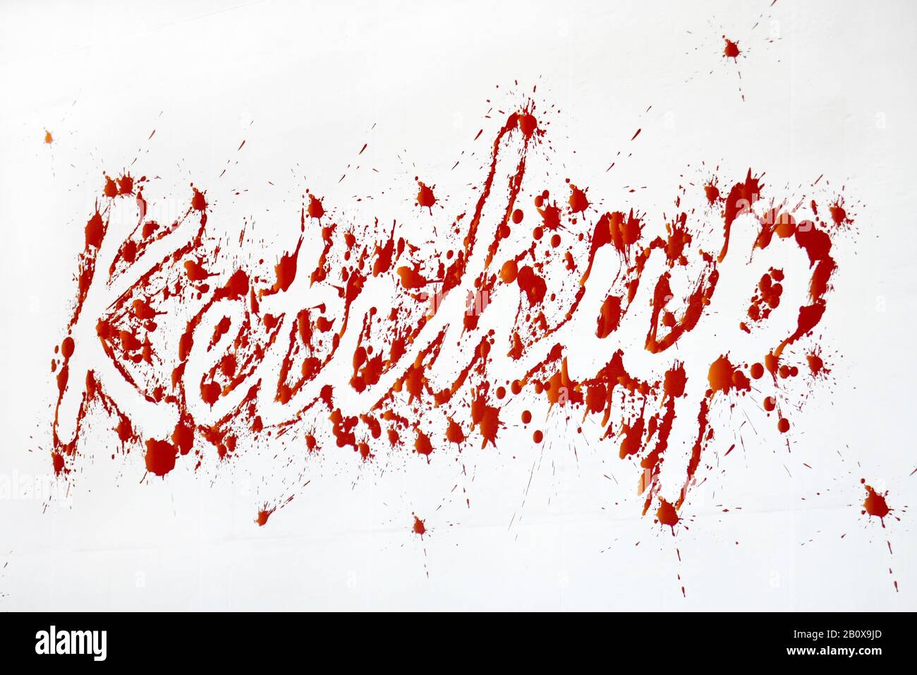 'Ketchup' lettering on white wall Stock Photo - Alamy