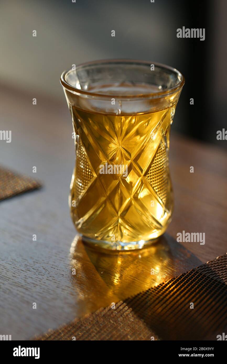 Photo of a delicious beautiful tea in a transparent glass Stock Photo ...