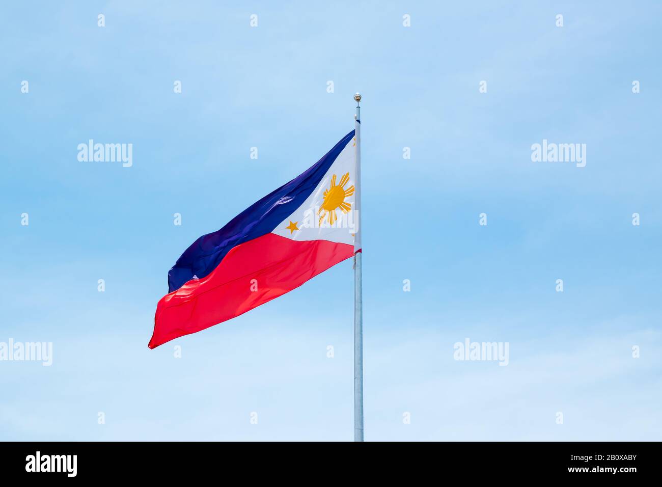 Flag of the Philippines. Three stars and a sun Stock Photo - Alamy