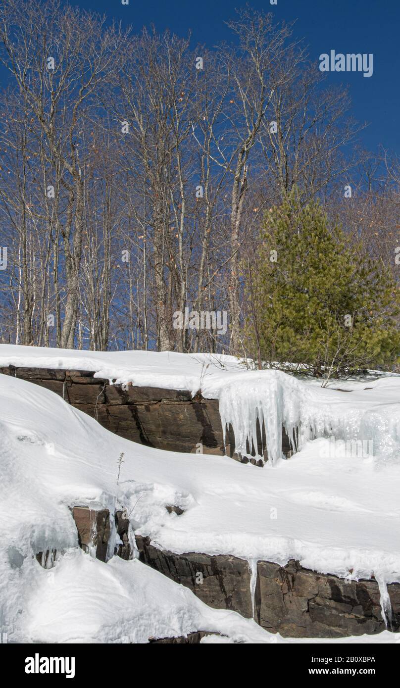 Ice, trees, rock in Muskoka in winter Stock Photo - Alamy