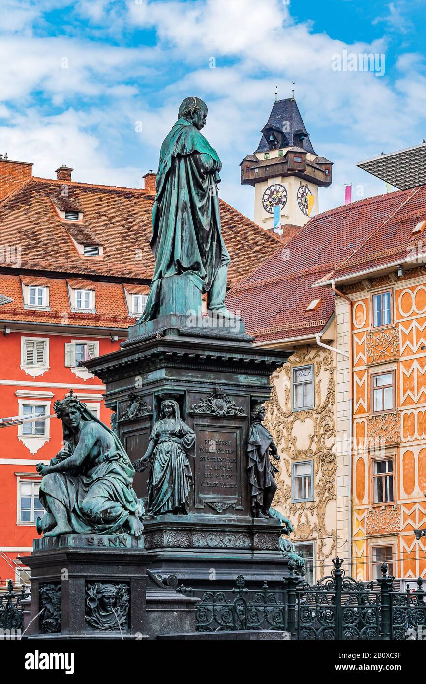 Statue in the middle of the Main Square of Graz and the Uhrturm Stock ...