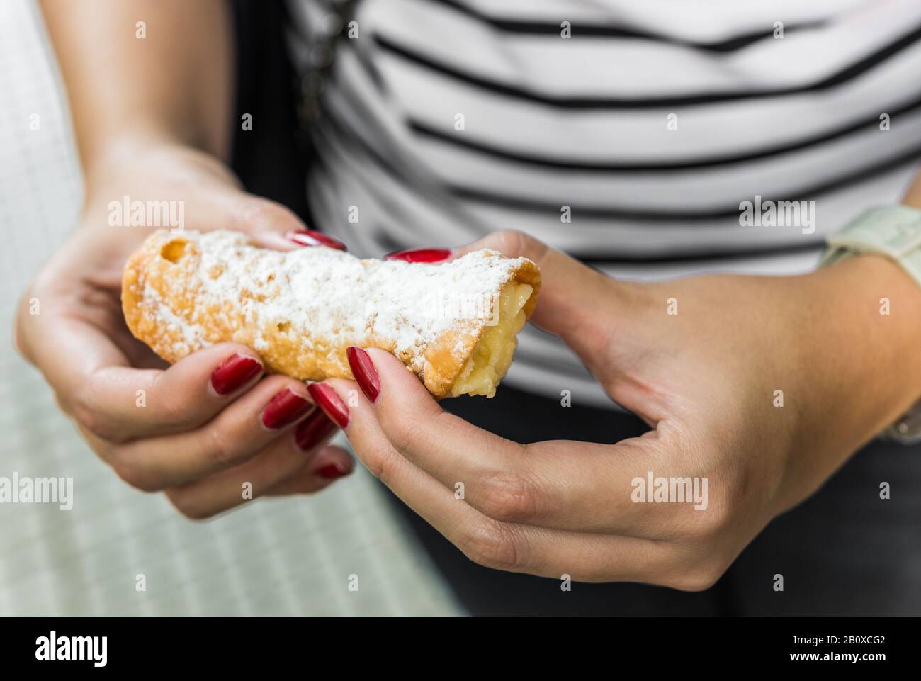 Close up of cannoli, a traditional Italian crunchy pastry with cream ...