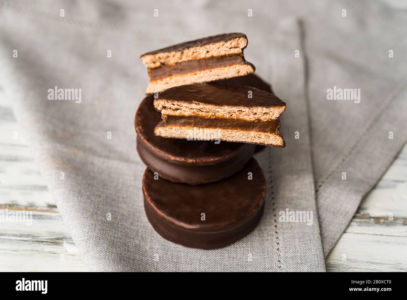 Alfajor with dulce de leche cake, Argentine dessert with chocolate and ...