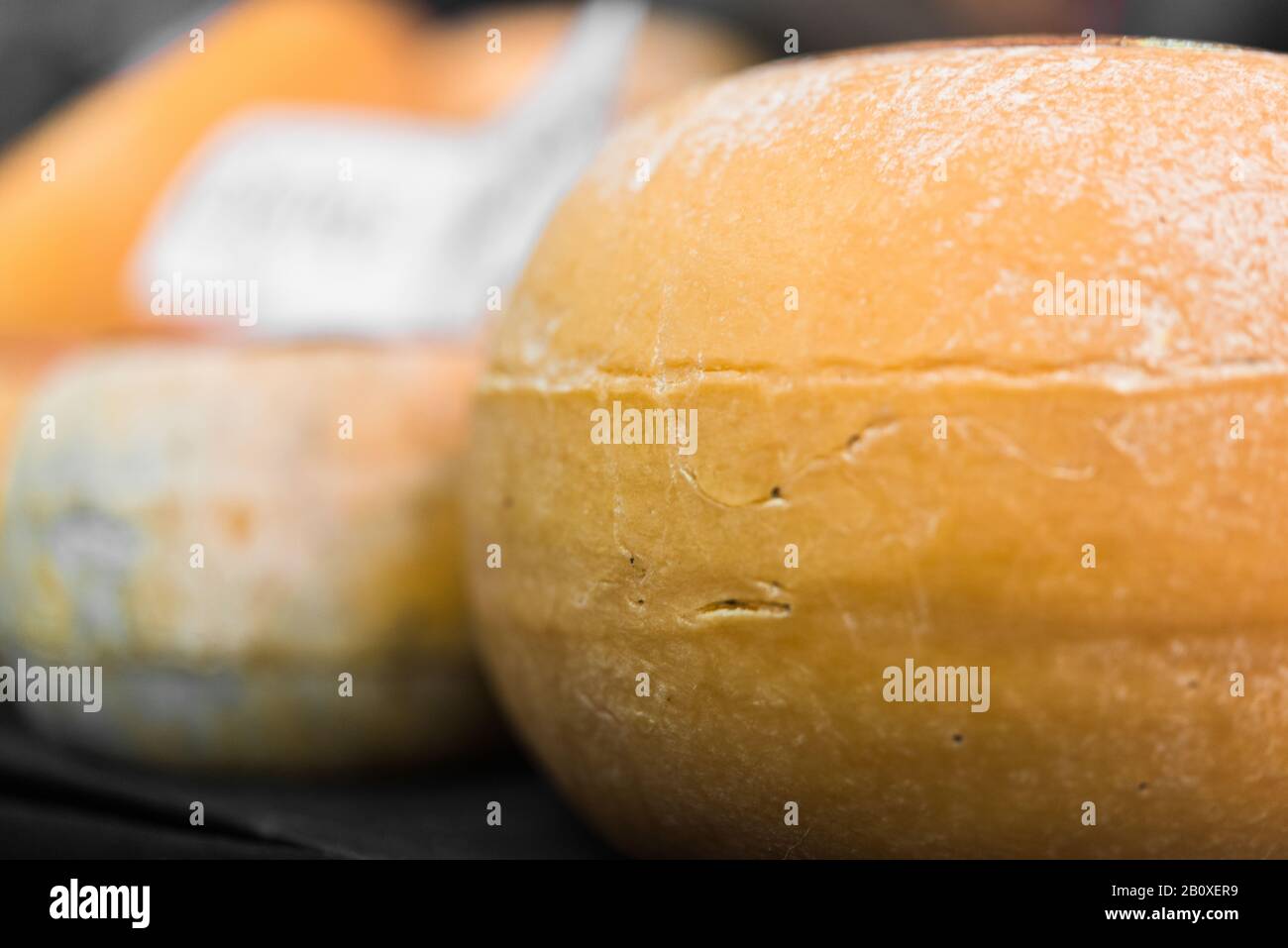 Selection of traditional Italian cheeses on a display, selective focus ...