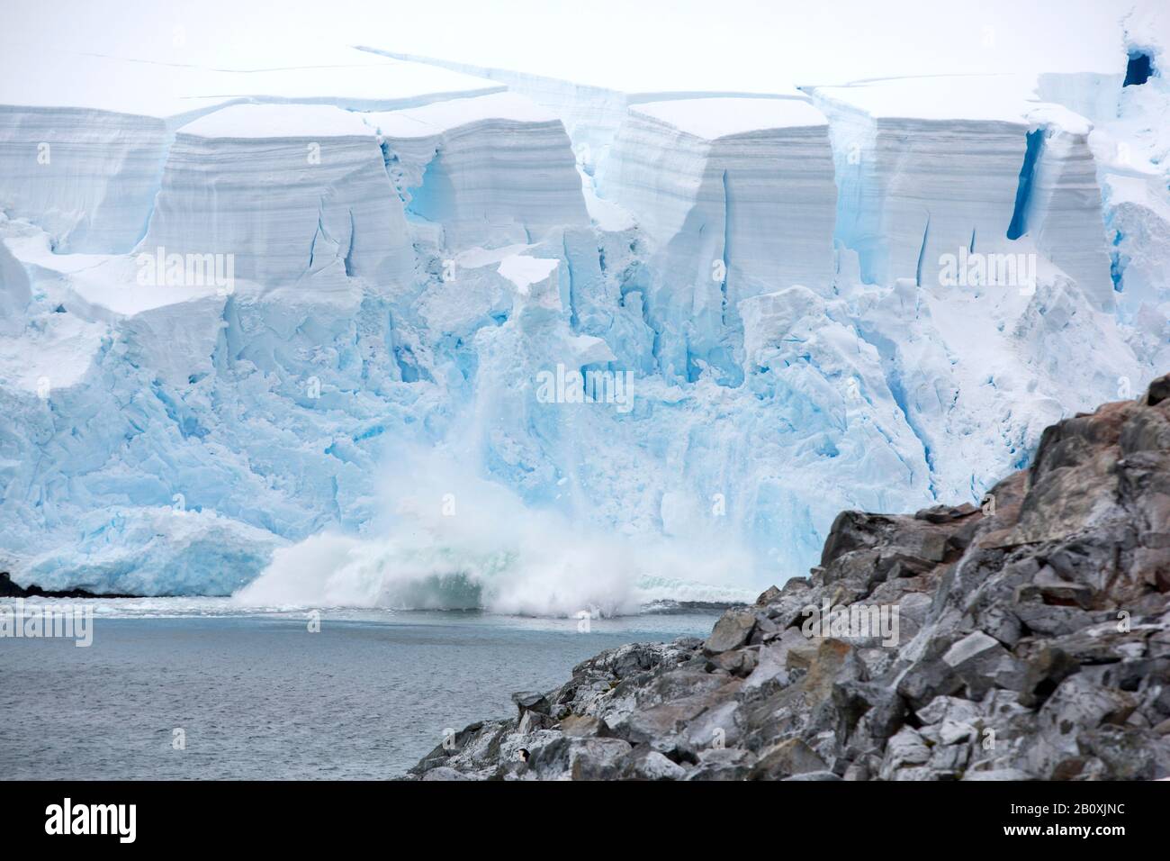 Seracs collapsing off the snout of a receding glacier on Two Hummock ...