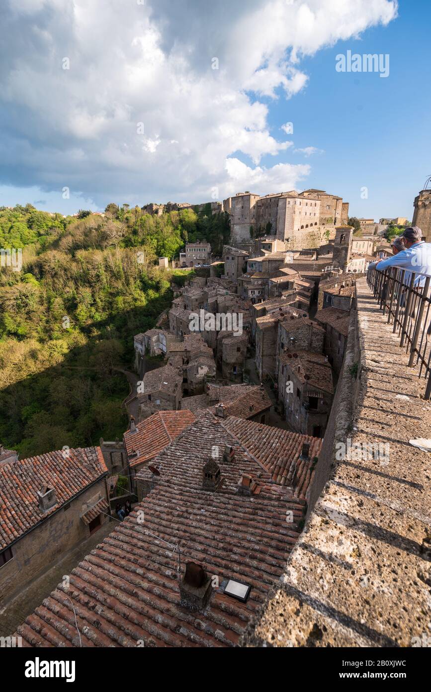 Panoramic view of village in Italy with red brick houses in Sovana ...