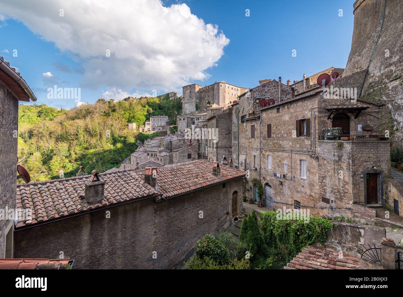 Panoramic view of village in Italy with red brick houses in Sovana ...