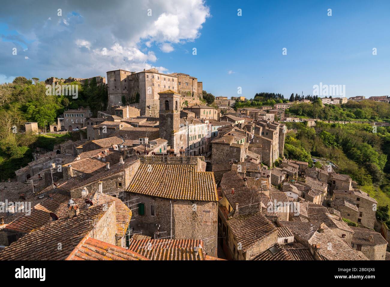 Panoramic view of village in Italy with red brick houses in Sovana ...
