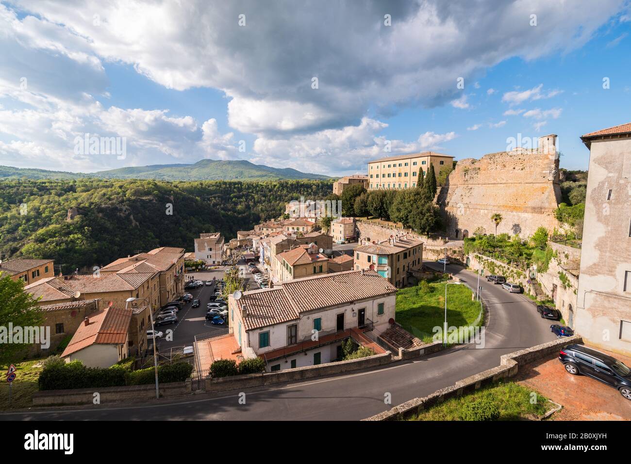 Panoramic view of village in Italy with red brick houses in Sovana ...