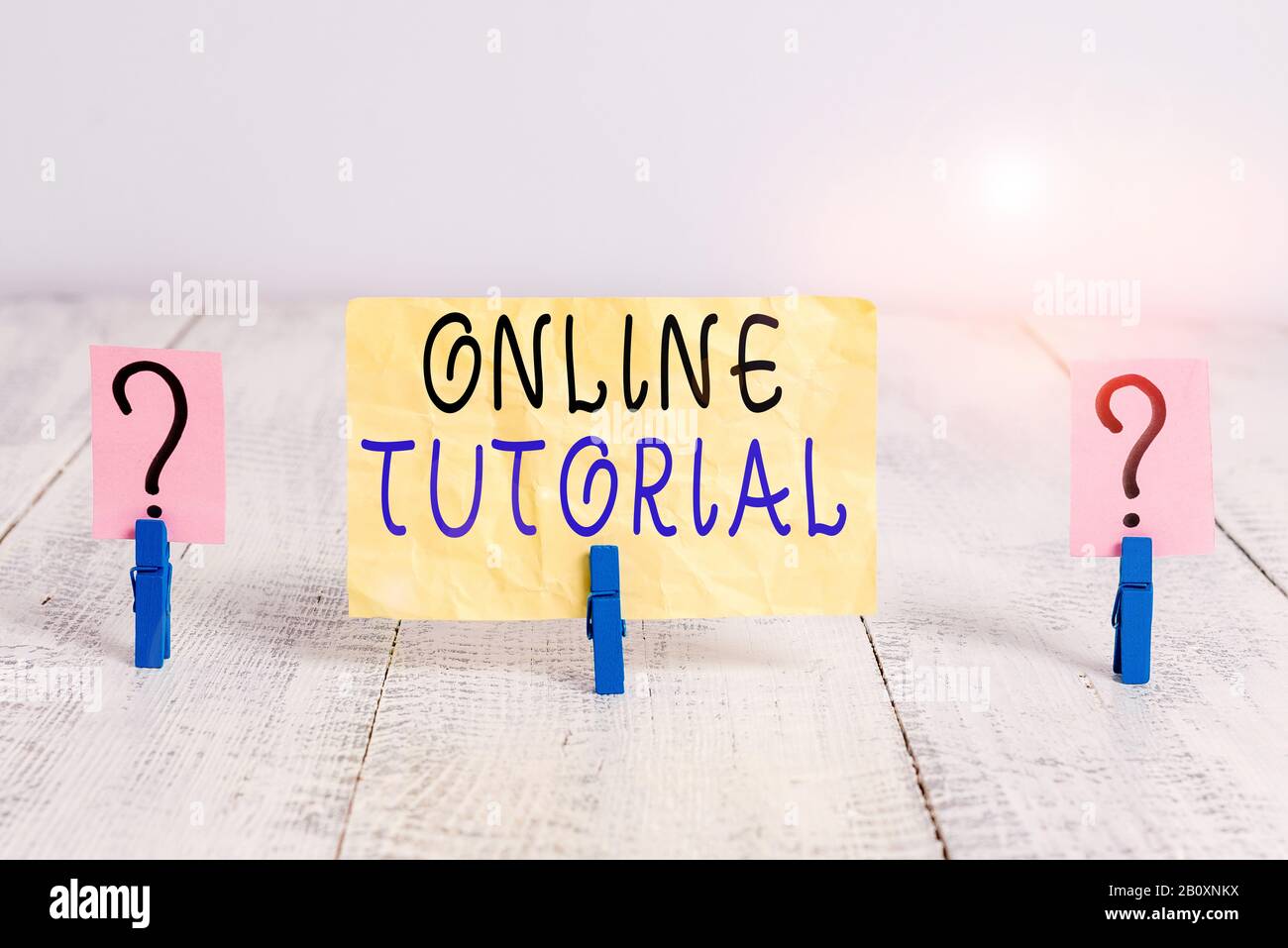 Writing note showing Online Tutorial. Business concept for process of ...