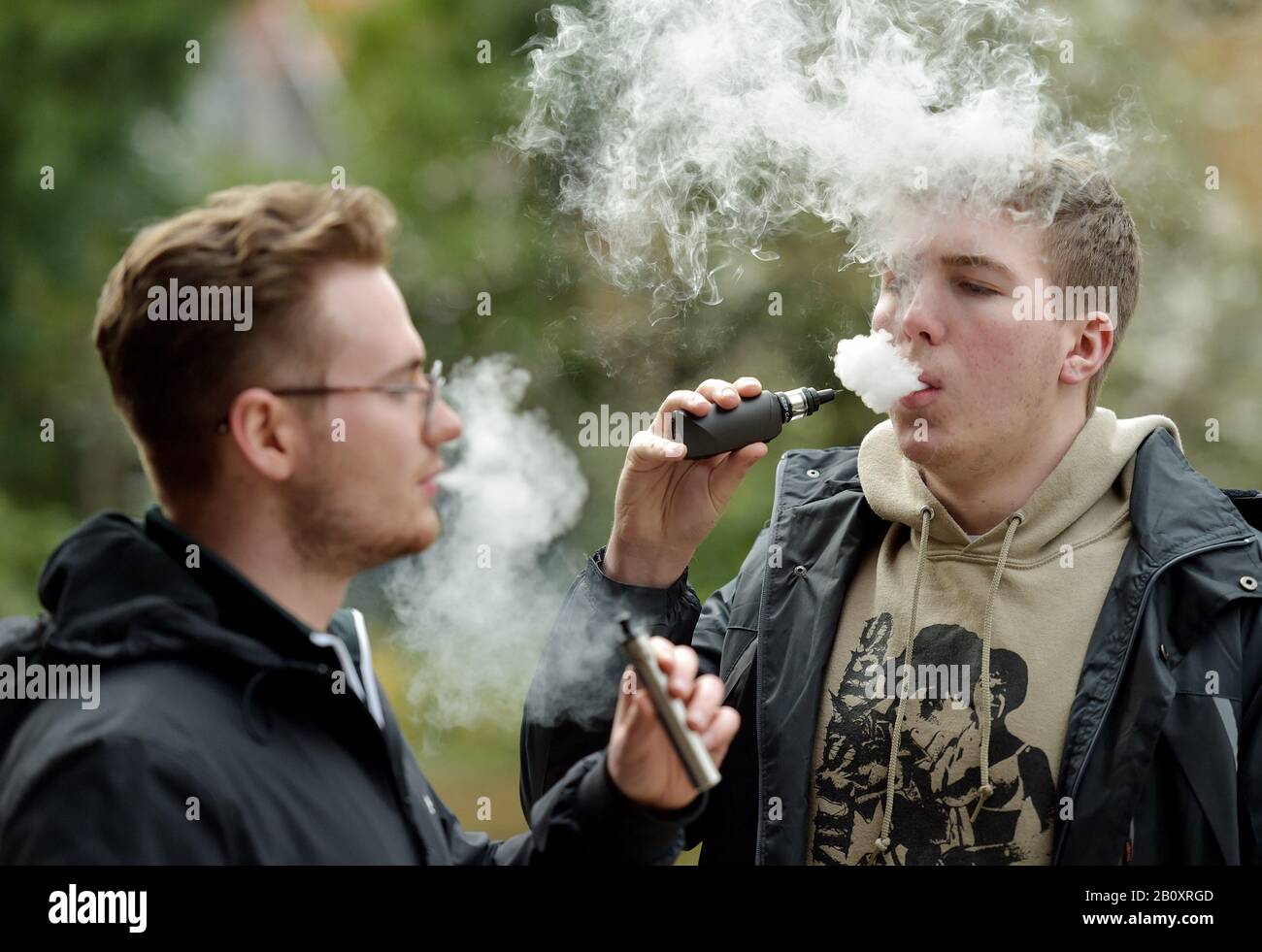 Stock photo of men vaping. PA Photo. Picture date: Friday February 21 ...