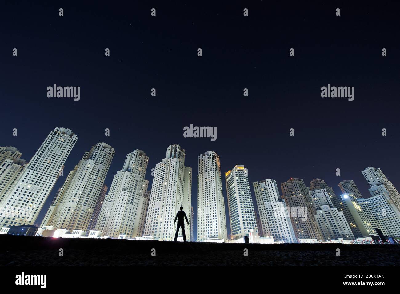 Man on the beach in new dubai hi-res stock photography and images - Alamy