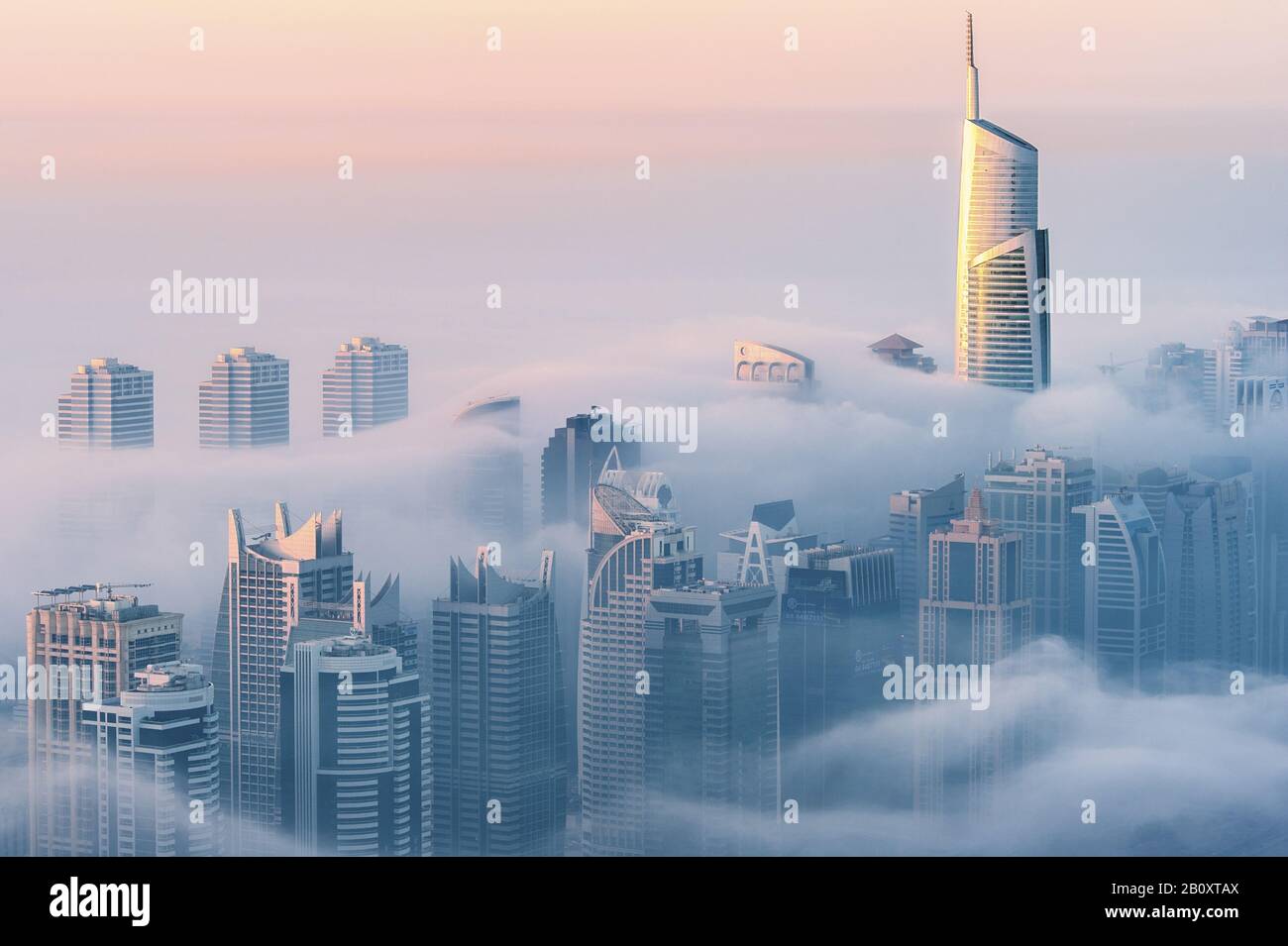 Jumeirah Lake Towers in the fog, Dubai, United Arab Emirates Stock ...
