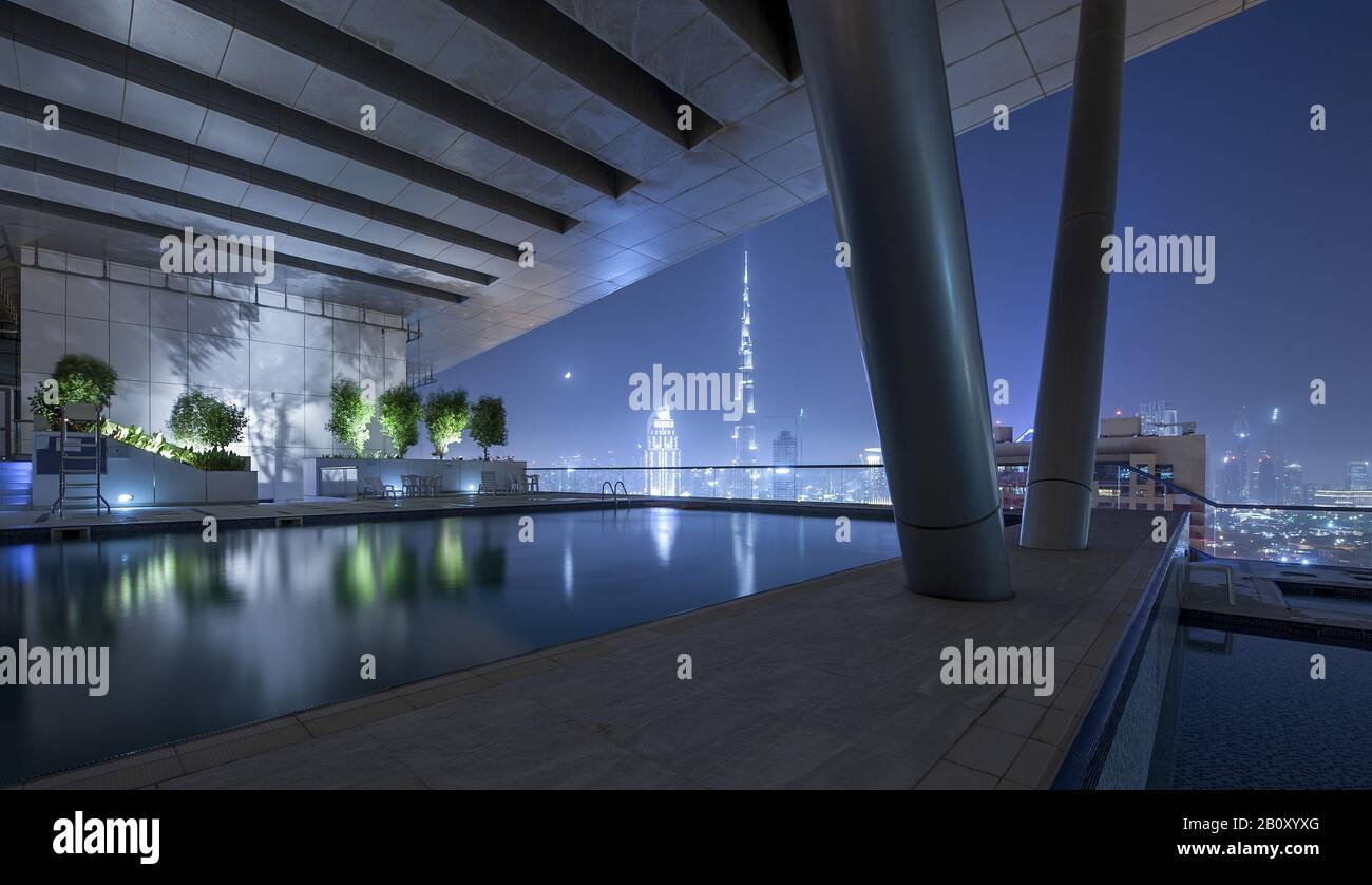 View of Burj Khalifa from the pool on the roof terrace of a residential ...