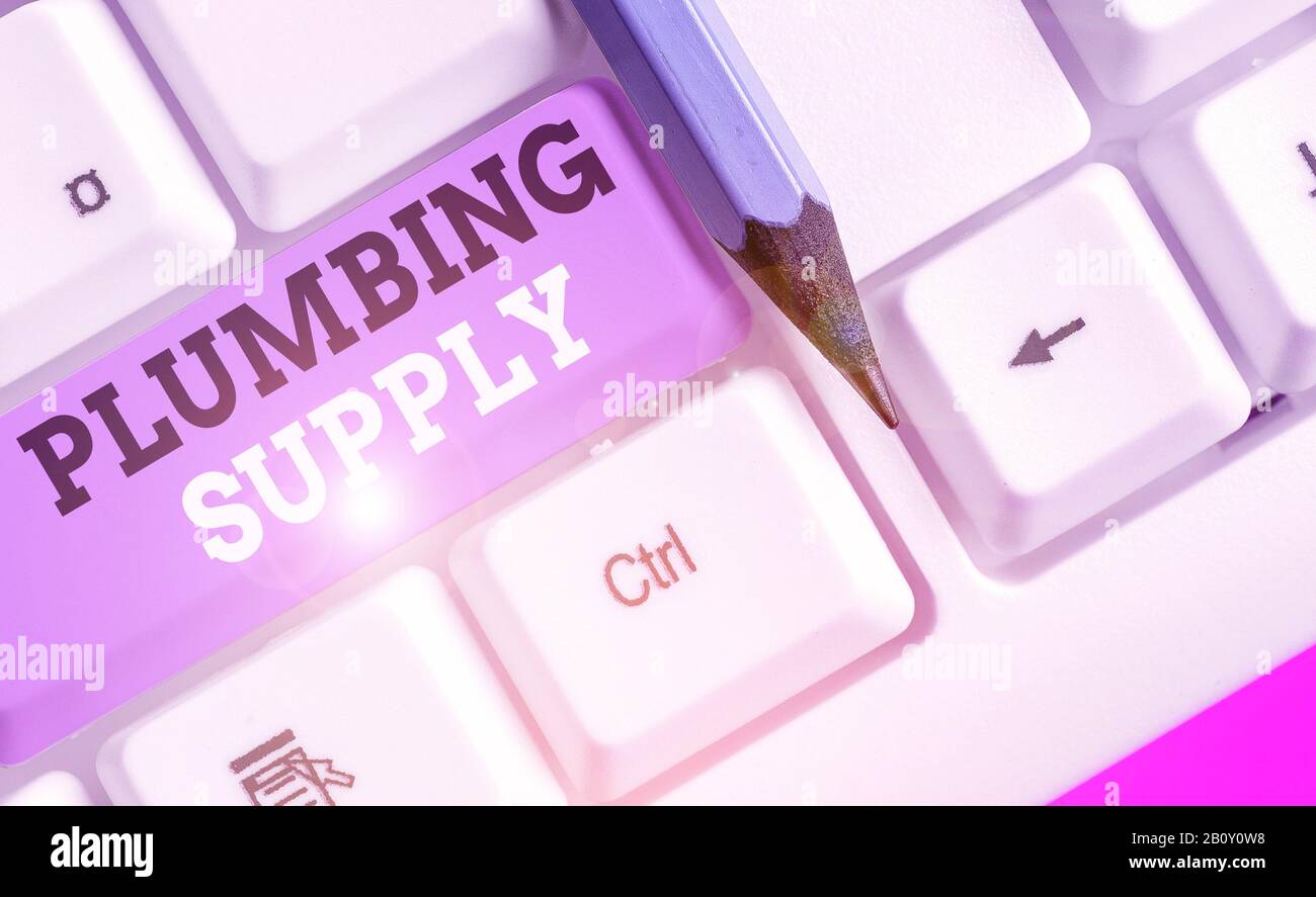 Writing note showing Plumbing Supply. Business concept for tubes or ...