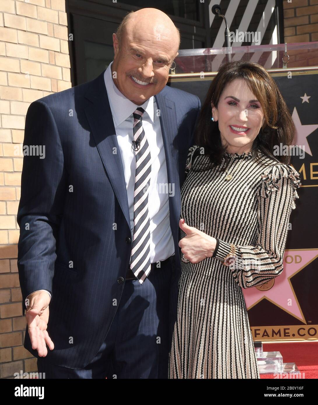 (L-R) Dr. Phil McGraw and Wife Robin McGraw at his Star On The ...
