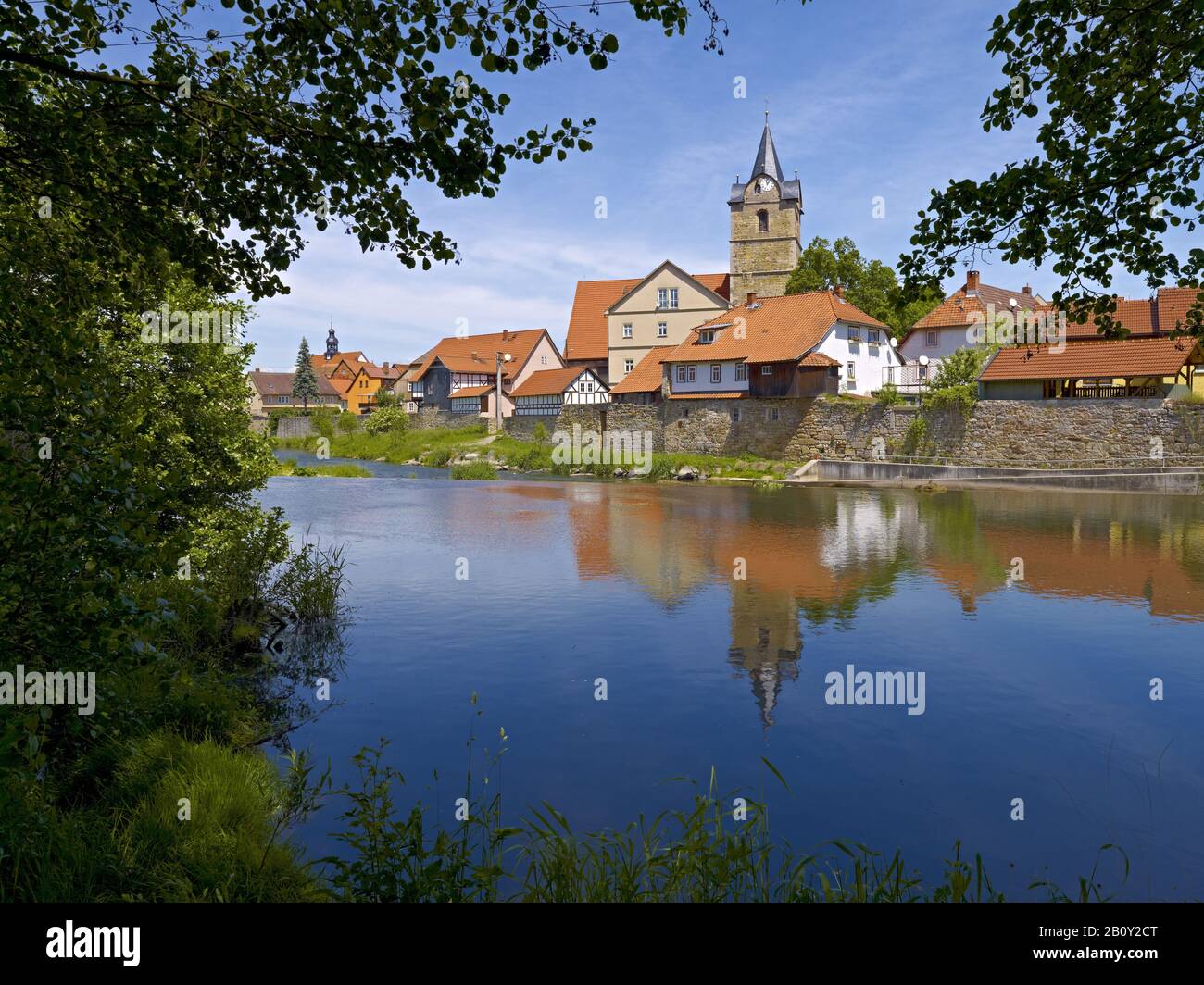 Stadtkirche St. Bartholomäus with city wall and Werra in Themar ...