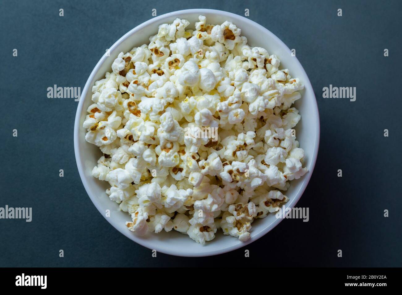 popcorn to enjoy the movie Stock Photo - Alamy